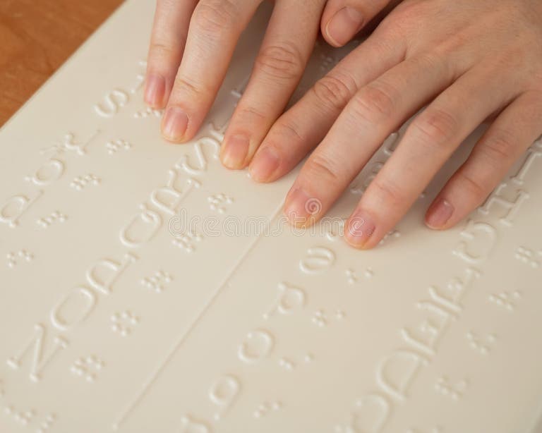 A Woman Learns the Braille Alphabet Using a Decoder. Stock Image ...