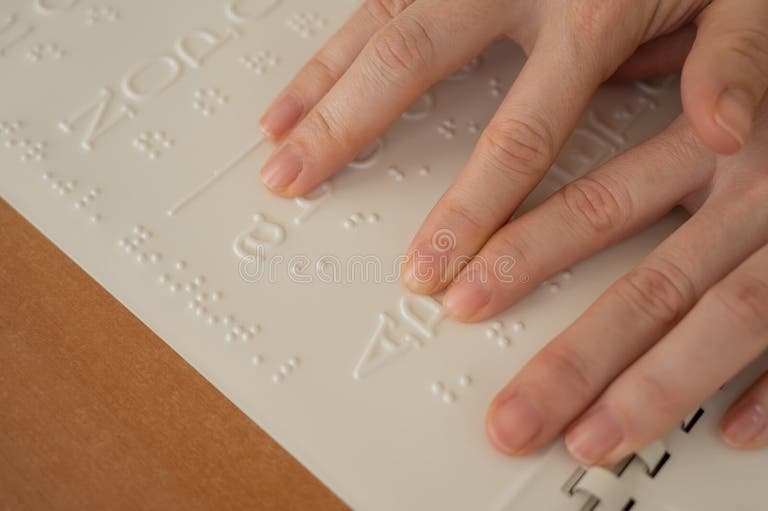 A Woman Learns the Braille Alphabet Using a Decoder. Stock Image ...