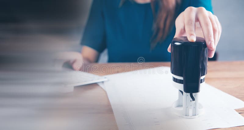 The Woman Leaves a Stamp on Paper and Types on the Keyboard Stock Photo ...