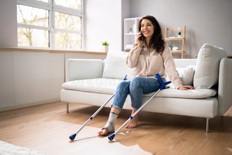 Woman with Leg Injury Using Crutches Stock Photo - Image of recovery ...