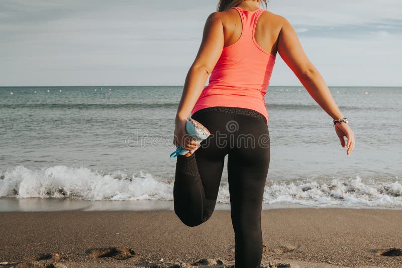Woman Leg Stretching at the Beach. Stock Image - Image of runner, ocean ...