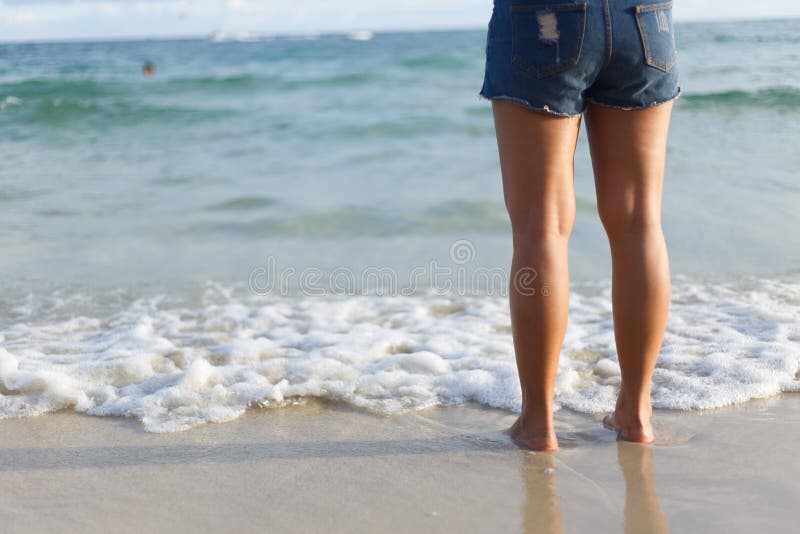 Back View of Beauty Woman Legs on the Beach Stock Photo - Image of care ...