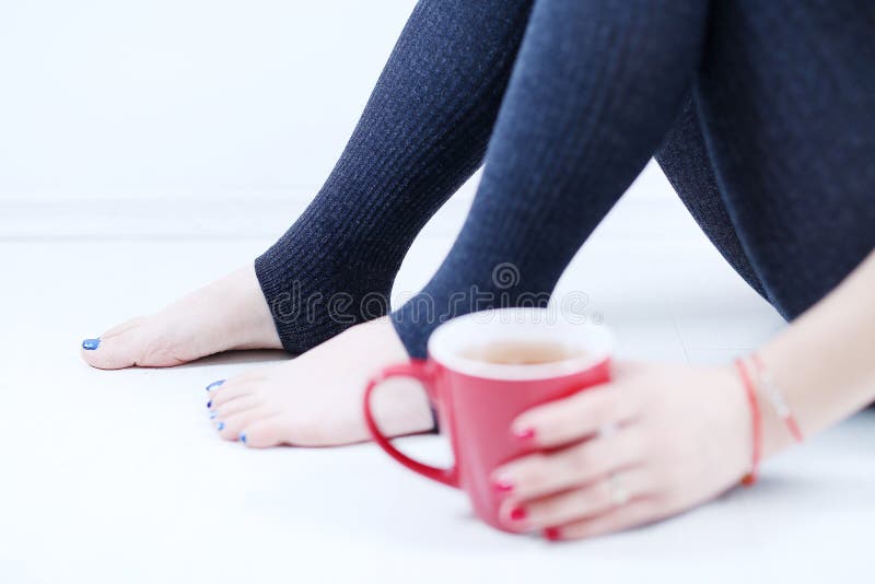 Woman legs on the couch stock image. Image of cloth, tights - 55898649