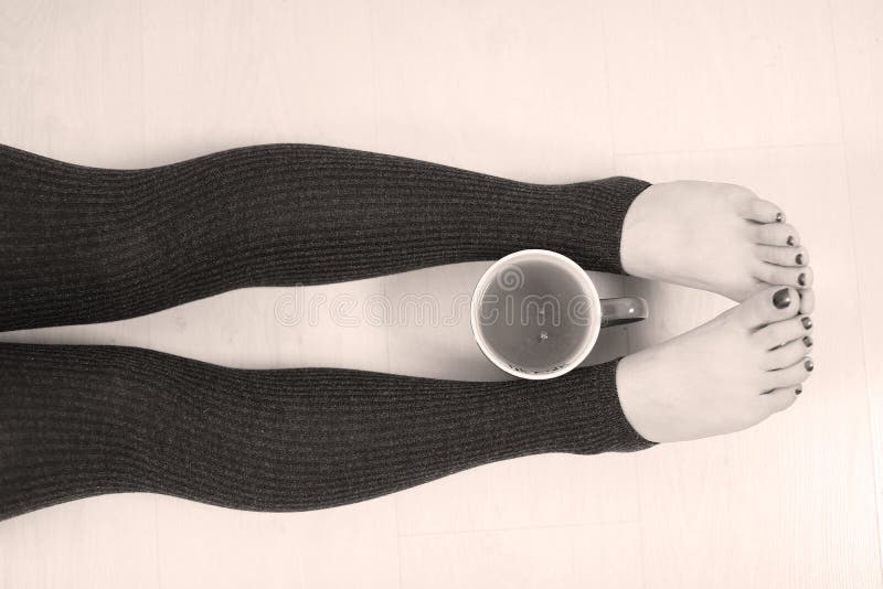 Woman legs and coffee stock photo. Image of clothing - 52773940