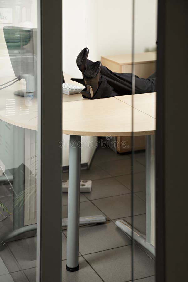 Woman legs on desk stock image. Image of computer, office - 23953683