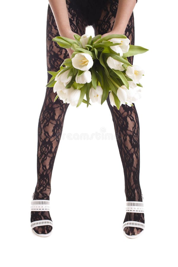 Woman legs and flowers stock photo. Image of present - 23854180