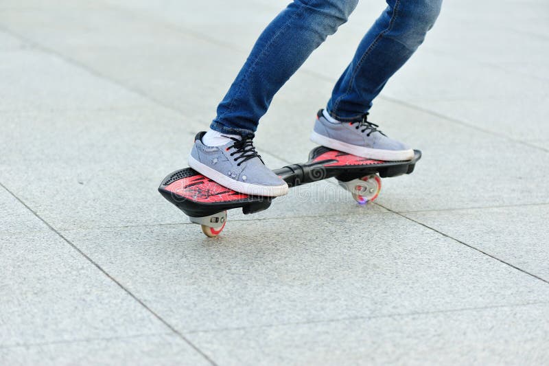Woman Legs Riding on Ripstick Stock Image - Image of shoes, urban: 61045565