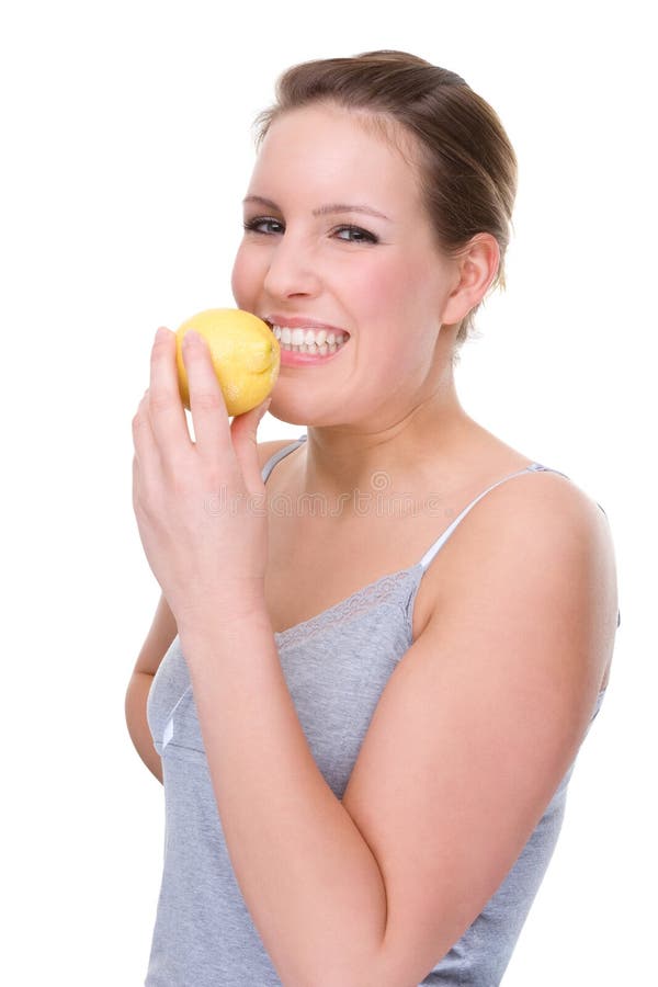 Woman sucking on a lemon stock photo. Image of squeeze - 13558790