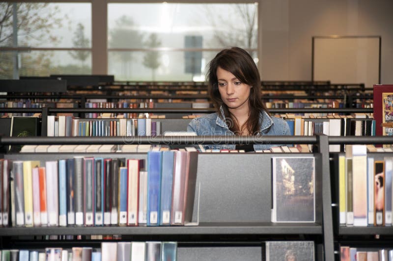 Woman in Library stock photo. Image of library, covers - 22106106