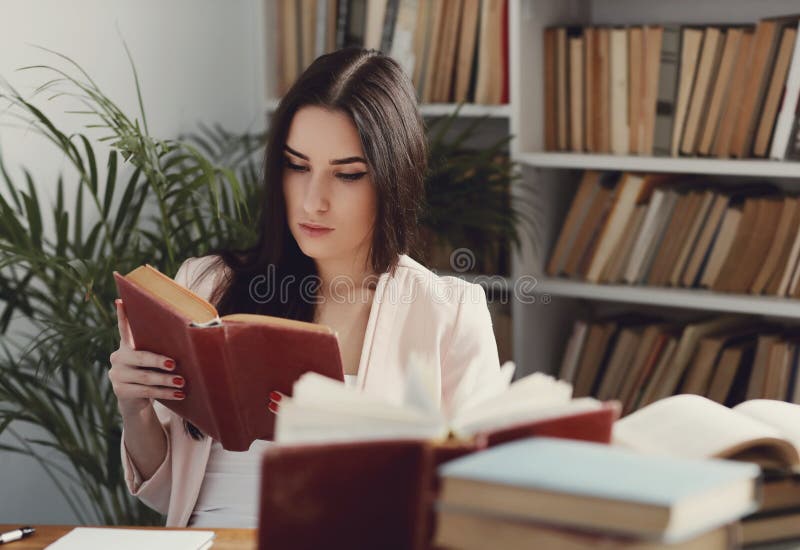 Woman in the library stock photo. Image of pretty, caucasian - 96273292