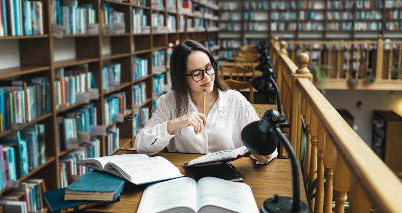 Student Studying at the Library Stock Image - Image of girl, studying ...