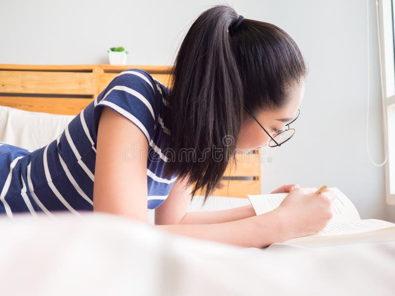 Woman Lie on Bed and Read Book. Stock Image - Image of hobby, female ...
