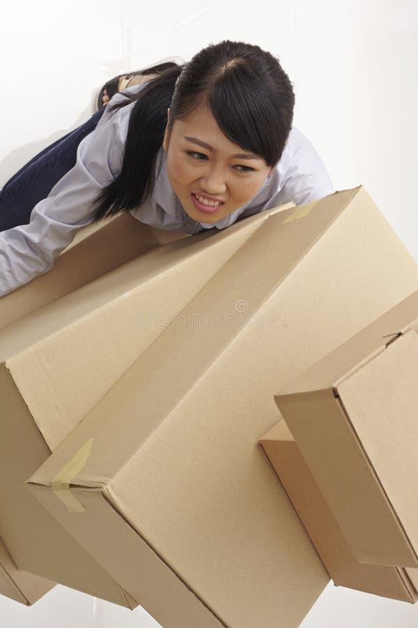 Woman lifting boxes stock image. Image of home, isolated - 105790167