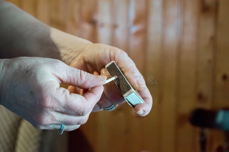 The Woman Lights a Match, Fire from a Match. Stock Image - Image of ...