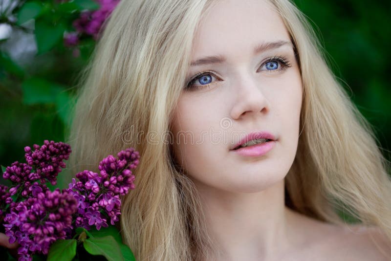 Woman with a Lilac Flowers. Stock Photo - Image of leaf, hair: 25321778