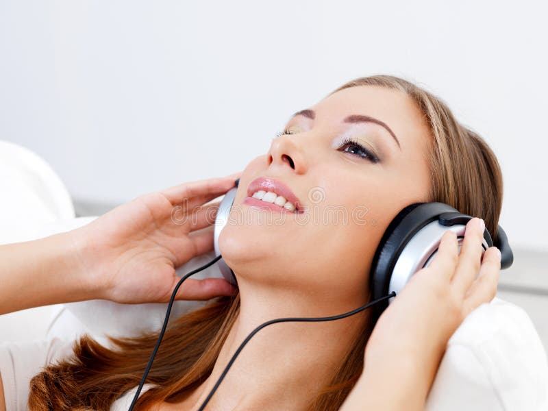 Woman Listening Music in Headphone Stock Image - Image of living ...