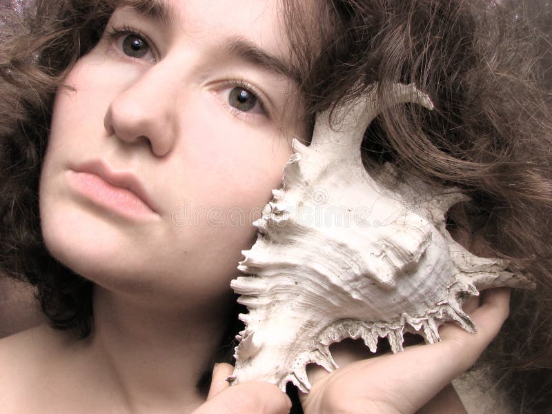 Woman Listening To the Seashell Stock Photo - Image of sunny ...
