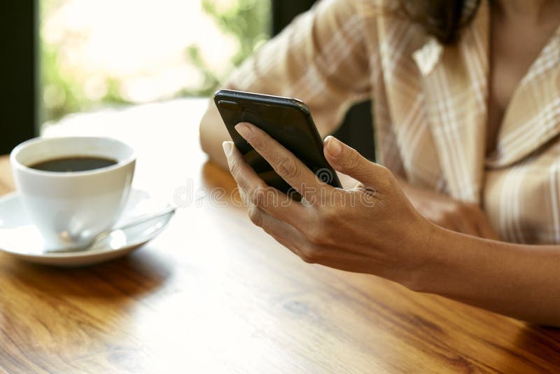 Woman in Living Room is Using Smart Phone Stock Photo - Image of ...