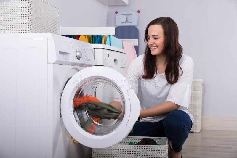 Woman Loading Clothes in Washing Machine Stock Image - Image of hygiene ...