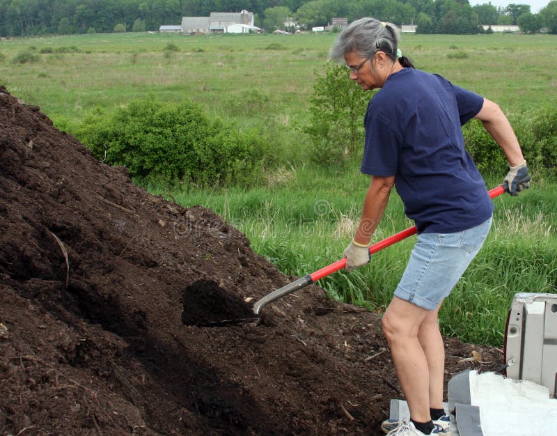 Man unloading compost stock image. Image of mulch, compost - 17657479