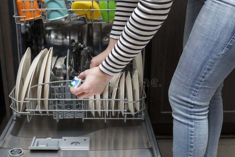 Woman Loading Dishwasher Machine in the Kitchen Stock Image - Image of ...