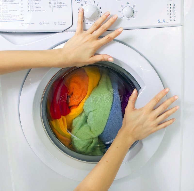 Woman Loading Washing Machine Stock Photo - Image of color, household ...
