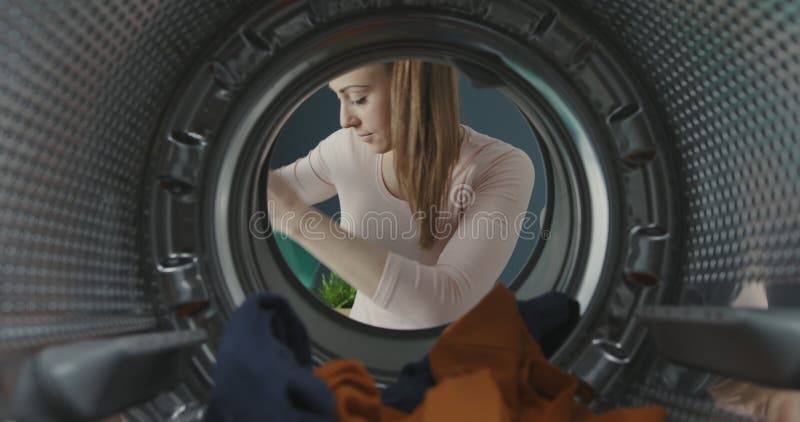 In a Washing Machine, a Drum with Water and Detergent is Spinning Stock ...