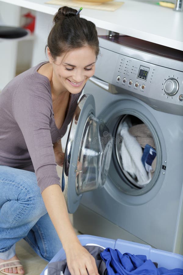 223 Washing Machine Lady Loading Stock Photos - Free & Royalty-Free ...