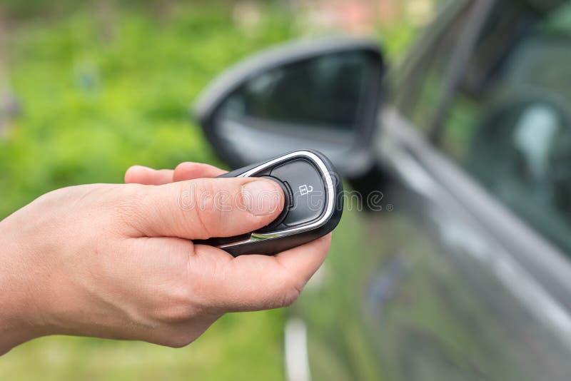 Woman Lock or Unlock Her Car with Car Remote Control Stock Photo ...