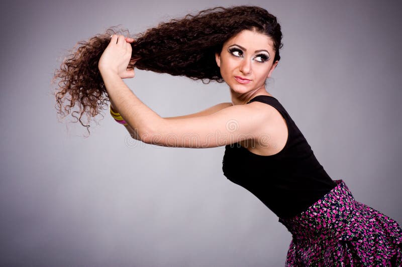 Woman with Long Ringlets Hair Stock Photo - Image of enjoy, color: 23669022