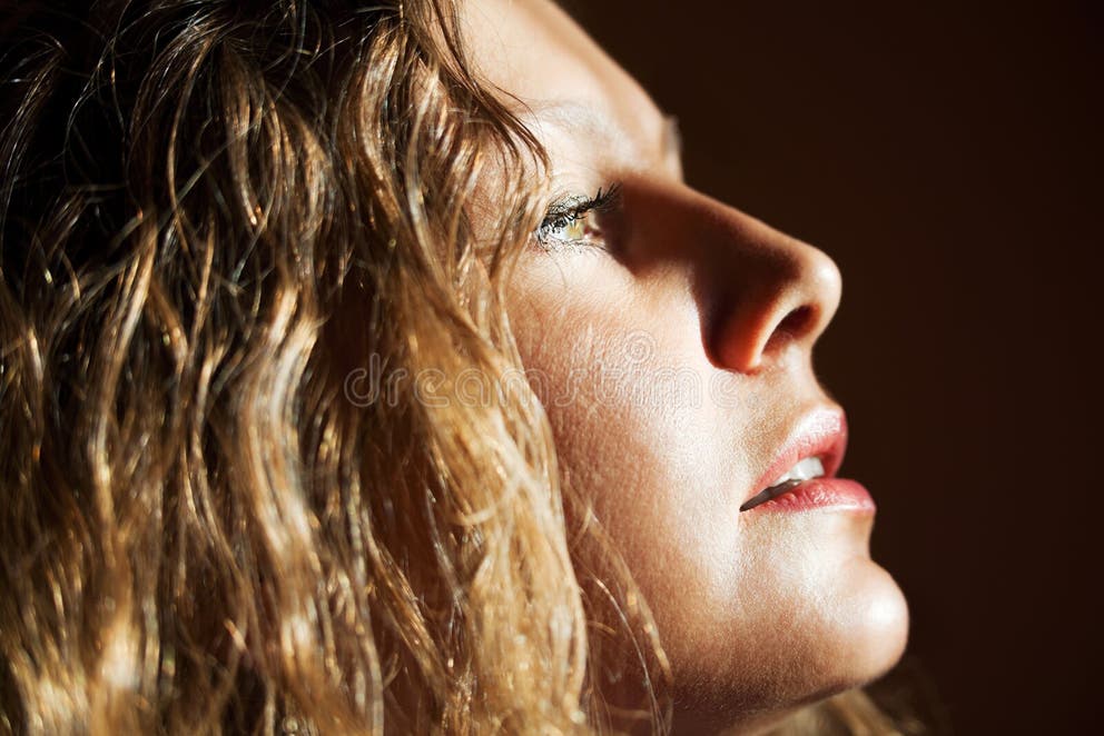 Sad Woman with Long Curly Hairs Looking Away Stock Photo - Image of ...