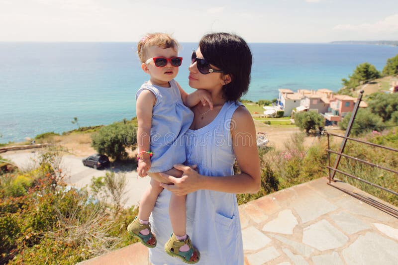 Woman Looking at Baby stock photo. Image of adult, outdoors - 50129338