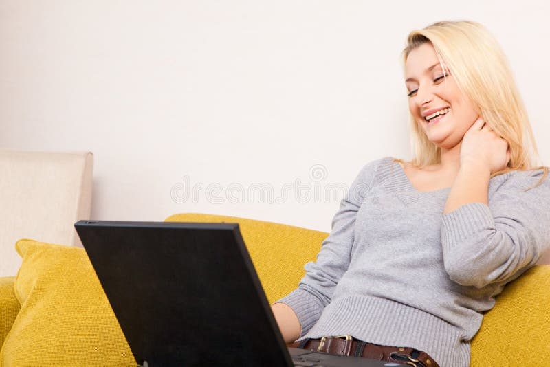 Woman Looking at Computer and Laughing Stock Image - Image of blond ...