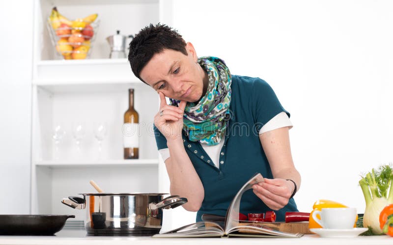 Woman Looking for Cooking Recipe Stock Image - Image of leek, knife ...
