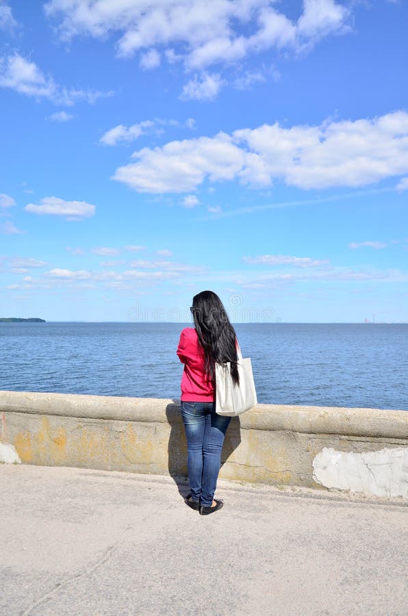Woman Looking into the Distance at Sea Stock Photo - Image of distance ...