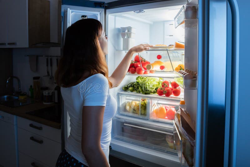 Woman Looking at Food in Refrigerator Stock Photo - Image of opened ...