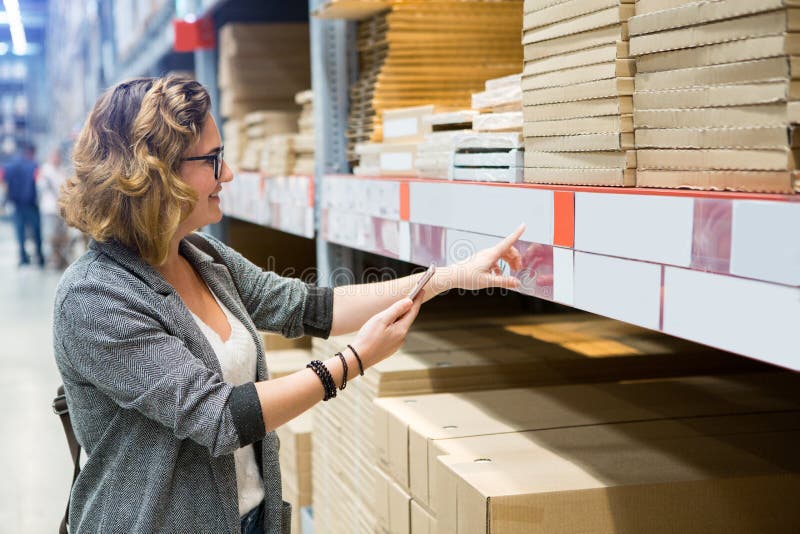 Woman in the Self-service Warehouse Stock Image - Image of industry ...