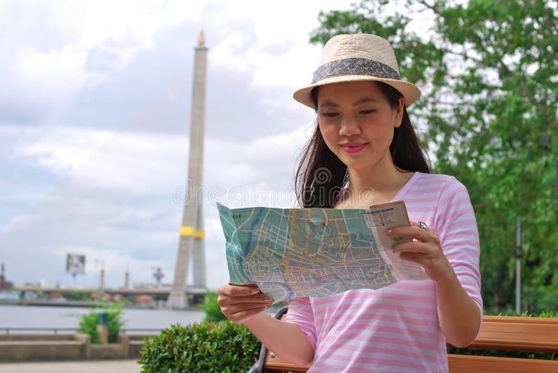 Woman looking the map stock photo. Image of pretty, touristic - 50038646