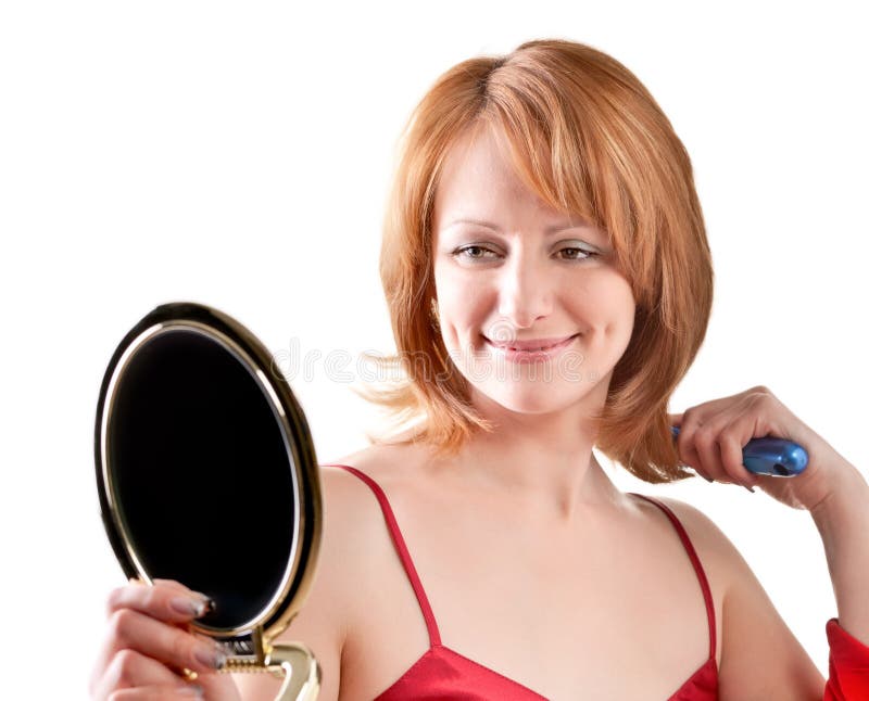 Woman Looking into a Mirror Stock Photo - Image of care, girl: 20761244