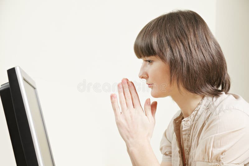 Woman looking at monitor stock photo. Image of attractive - 23953706