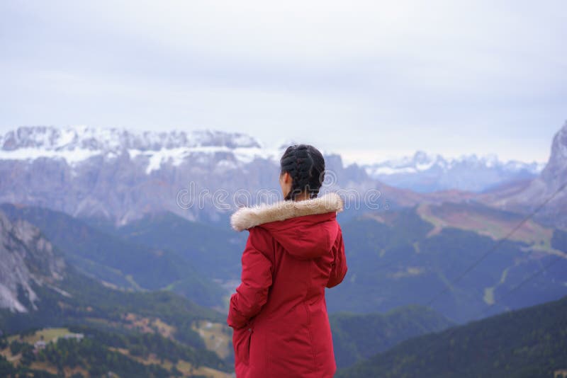 A Woman Looking at the Mountains on a Mountain Peak Stock Image - Image ...