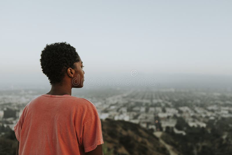 Woman Looking Out Over the City Stock Image - Image of thoughtful ...