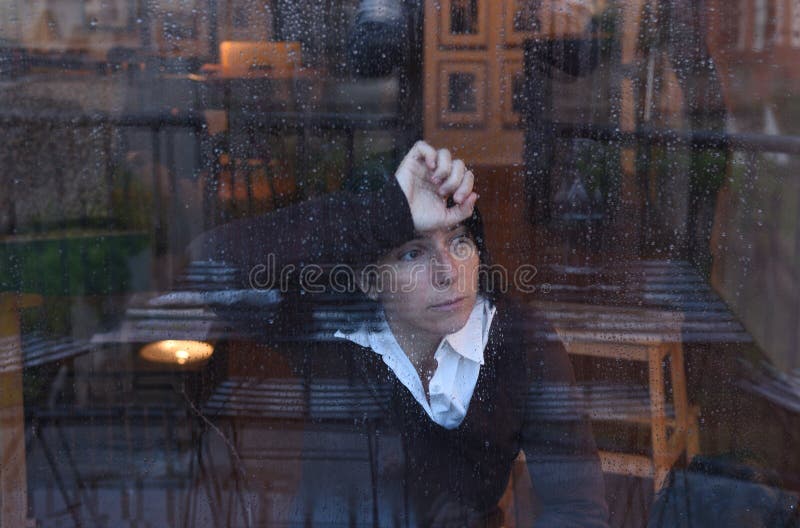 Woman Looking Out the Window on a Rainy Stock Photo - Image of alone ...
