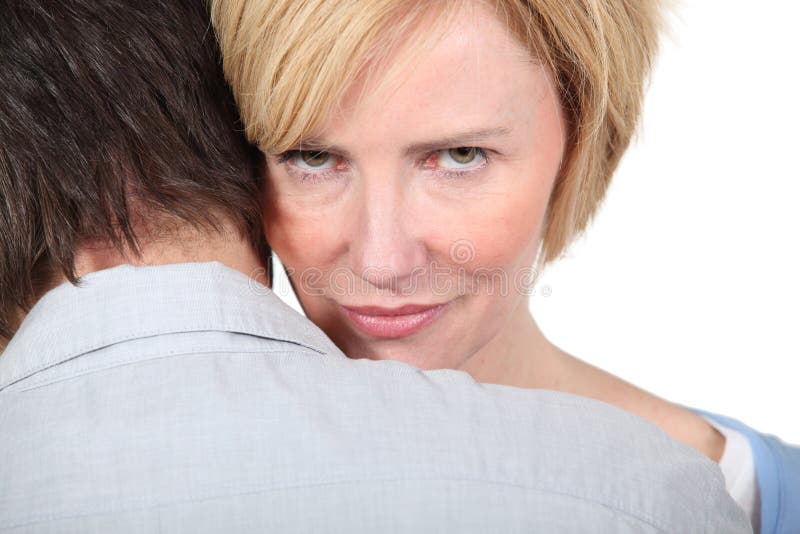 Woman looking over man stock photo. Image of indoors - 35737818