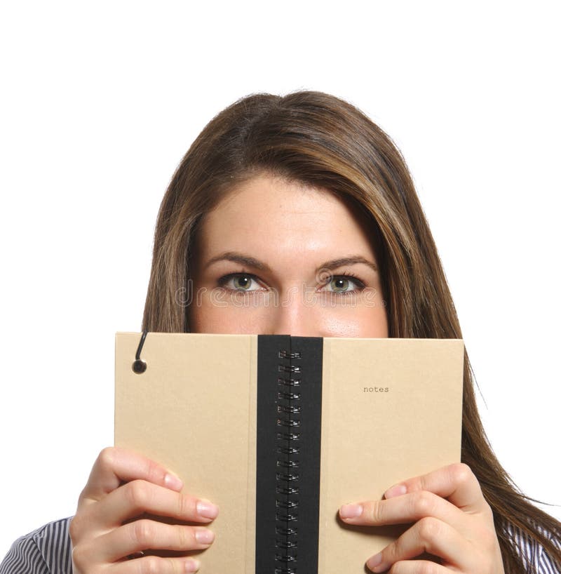 A Woman Looking Over a Note Book in the Studio Stock Image - Image of ...