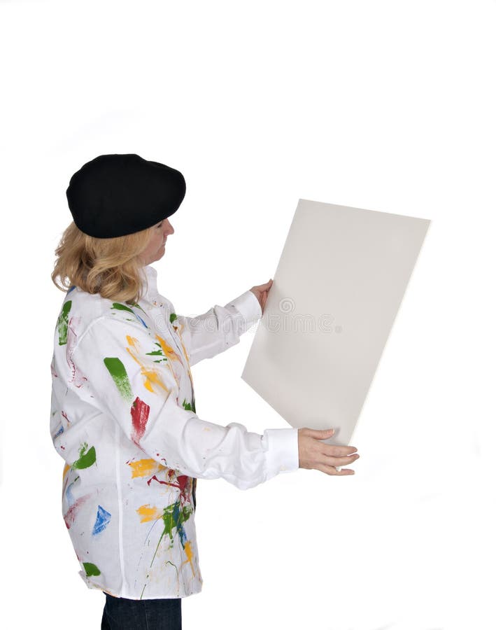 Woman looking at poster stock photo. Image of hand, canvas - 17604878