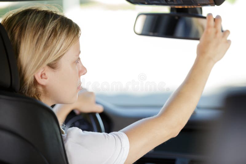Woman Looking in Rear View Mirror Car Stock Photo - Image of girl ...