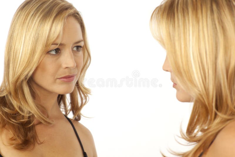 Woman Looking at Reflection in Mirror Stock Image - Image of face ...