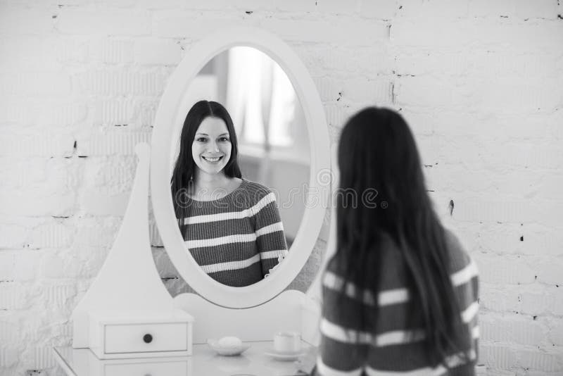 Woman Looking at Reflection in Mirror Stock Photo - Image of concept ...