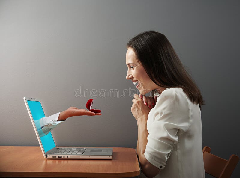 Woman looking at ring stock photo. Image of idea, dating - 31925032